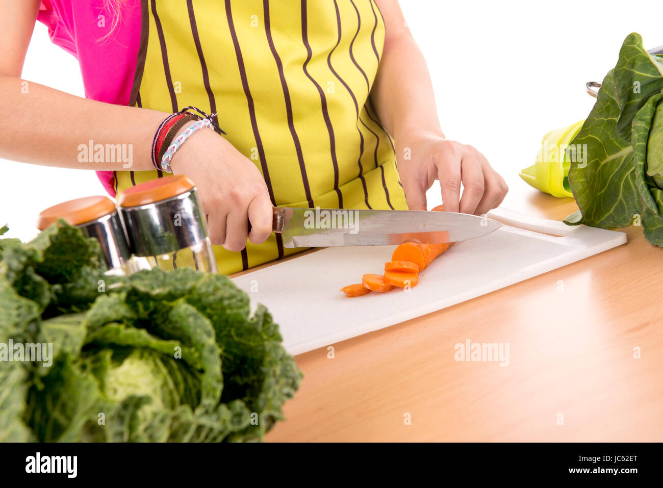Detail of woman's hands cooking Stock Photo - Alamy