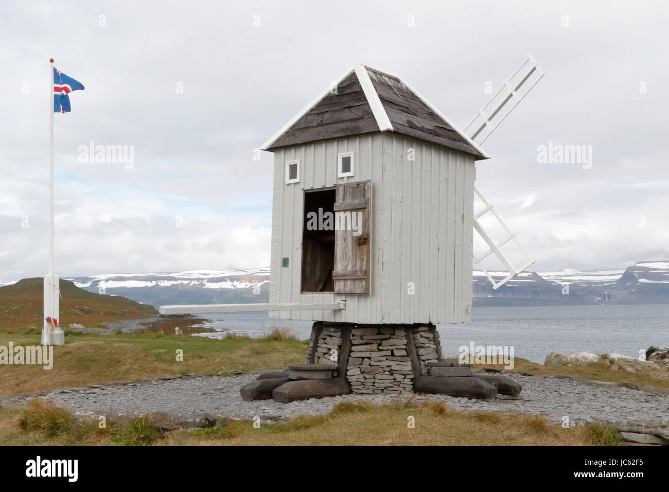 windmill on the island of Vigur, Iceland, and Icelandic flag Stock ...