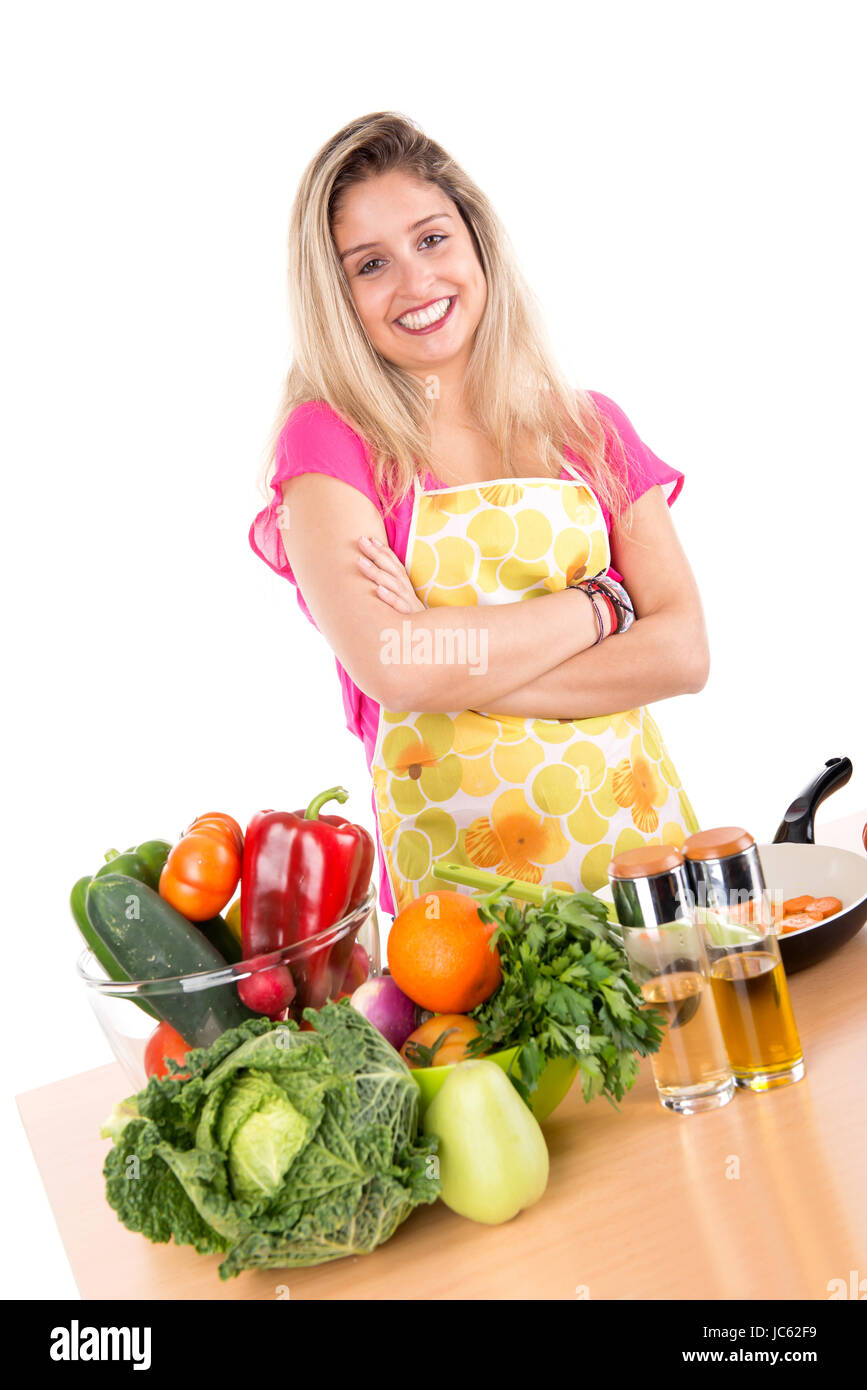 Beautiful woman cooking in the kitchen Stock Photo - Alamy