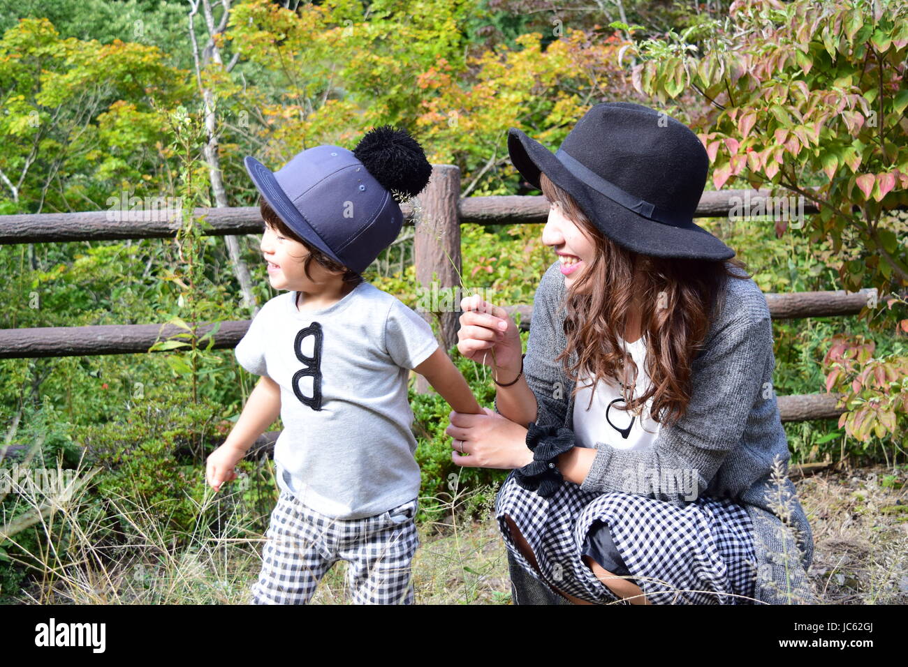 young japanese mother is playing with her son at outer place Stock Photo - Alamy