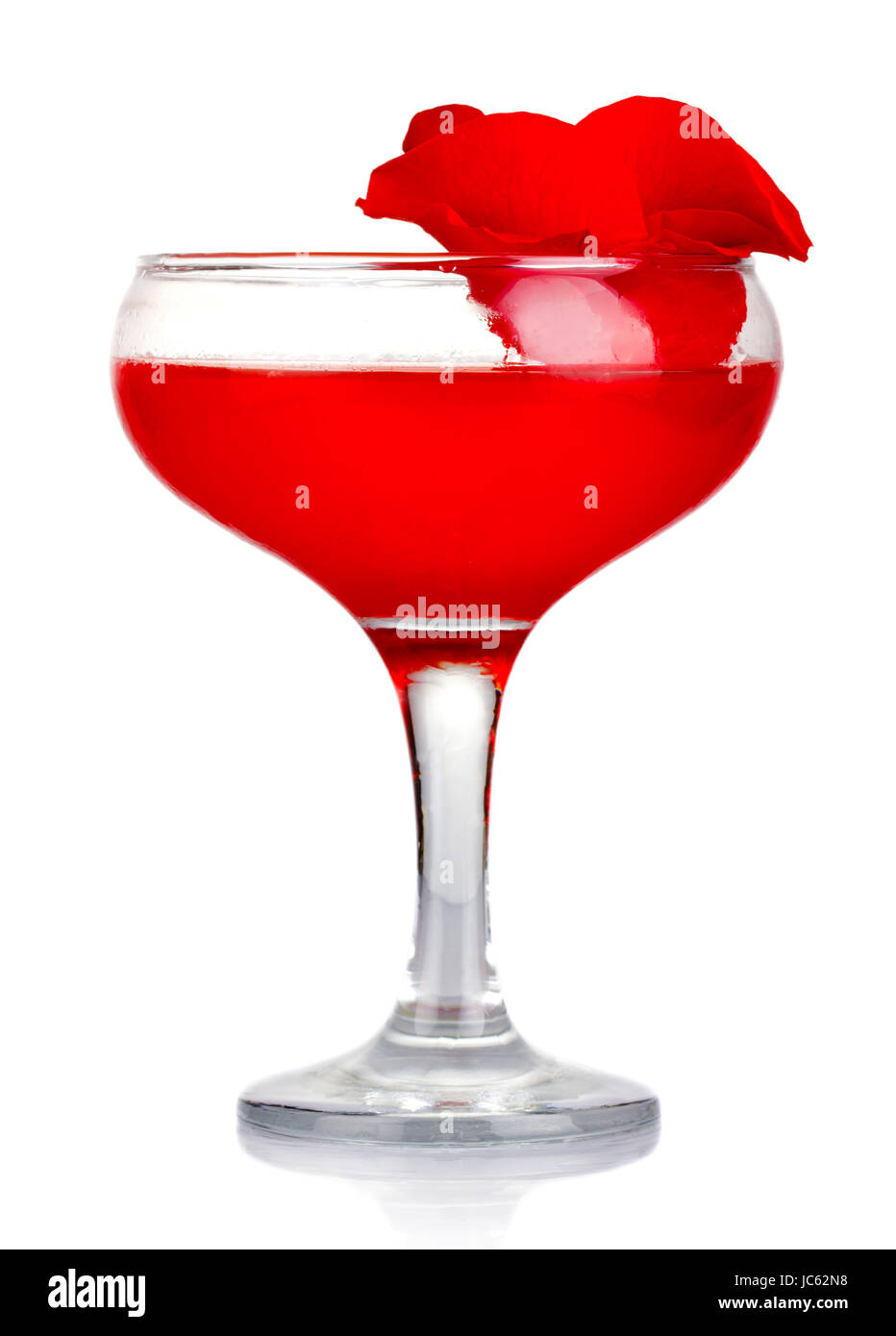 Red alcohol cocktail with rose petals isolated on white background ...