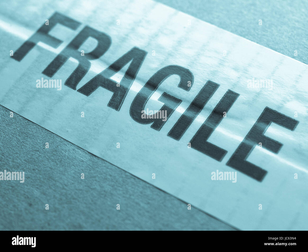 Detail of a fragile corrugated cardboard packet - cool cyanotype Stock Photo - Alamy
