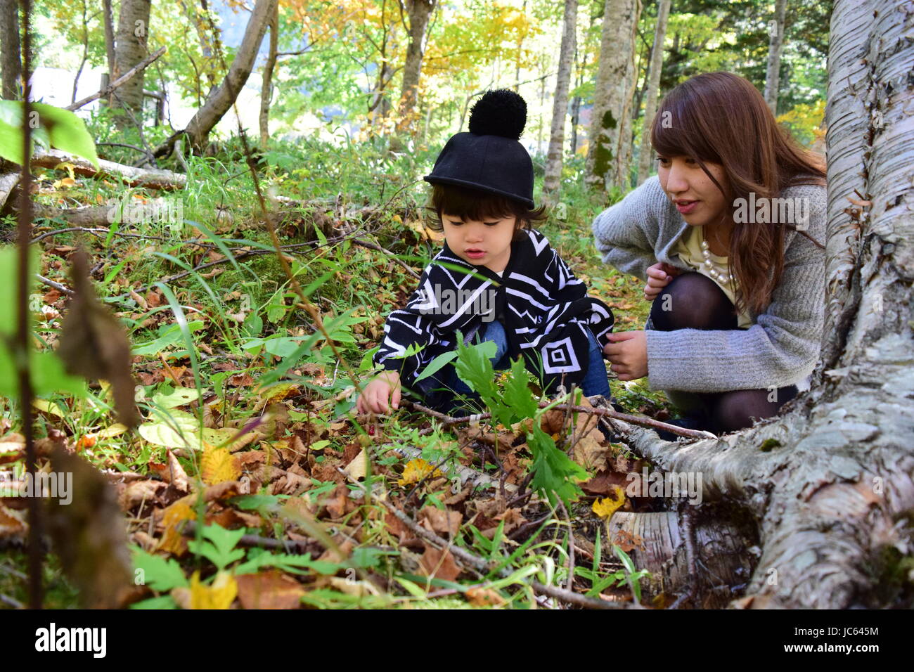 young japanese mother is playing with her son at outer place Stock Photo - Alamy