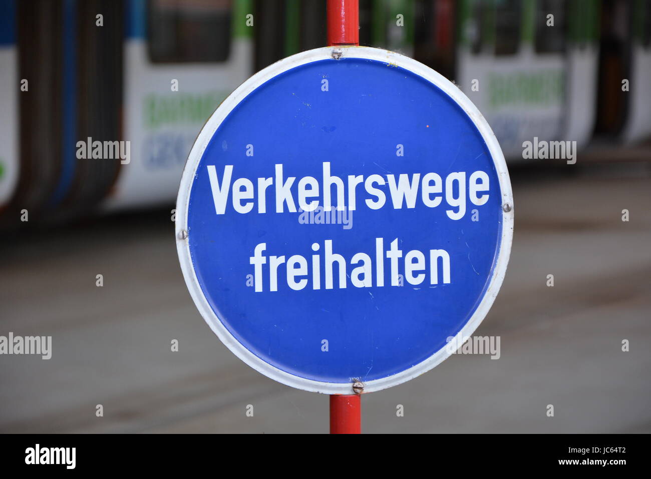 blue Warning sign for the road space Stock Photo - Alamy