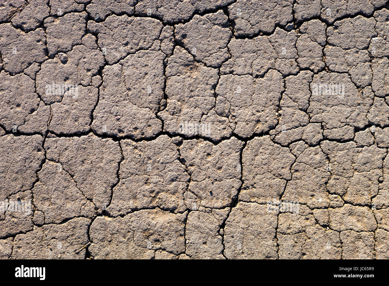 Cracked dry ground. Background or texture Stock Photo - Alamy
