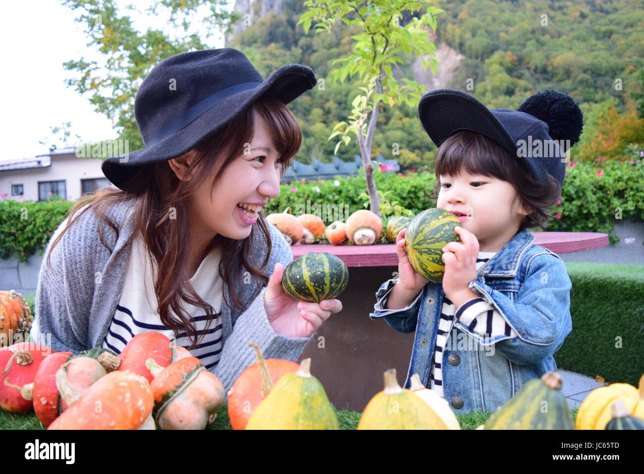 young japanese mother is playing with her son at outer place Stock Photo - Alamy