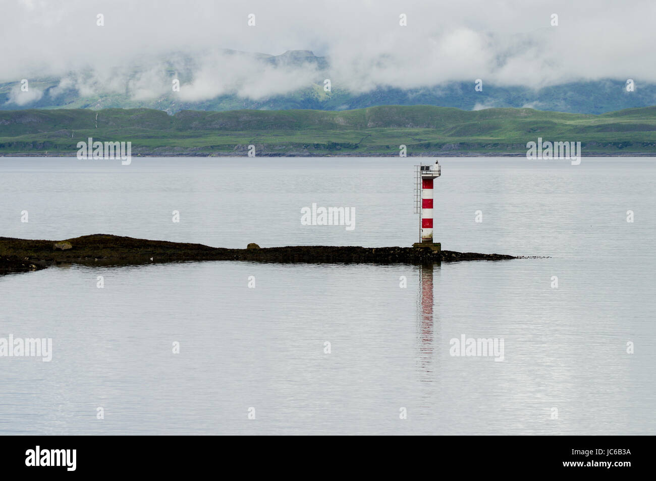 Beacon at the edge of Oban harbour in Scotland Stock Photo - Alamy