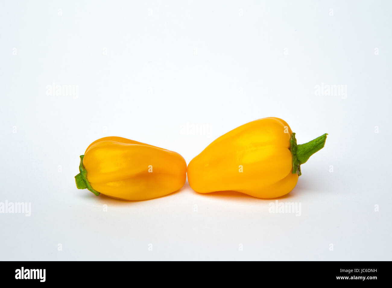 yellow cayenne chili pepper isolated on a white background Stock Photo ...
