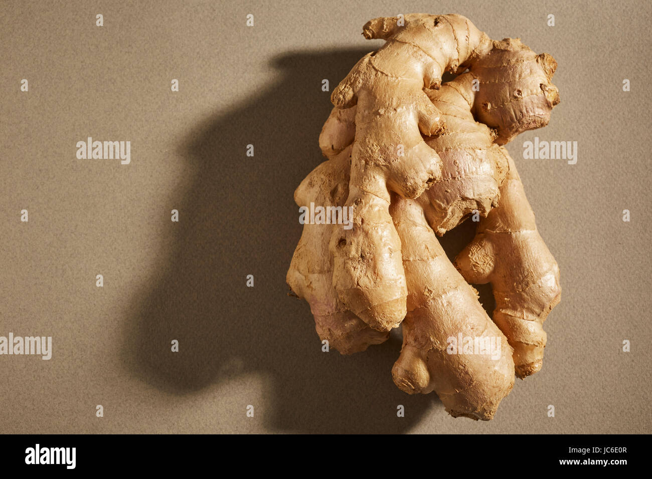 a whole fresh ginger root from China, an important ingredient in Asian ...