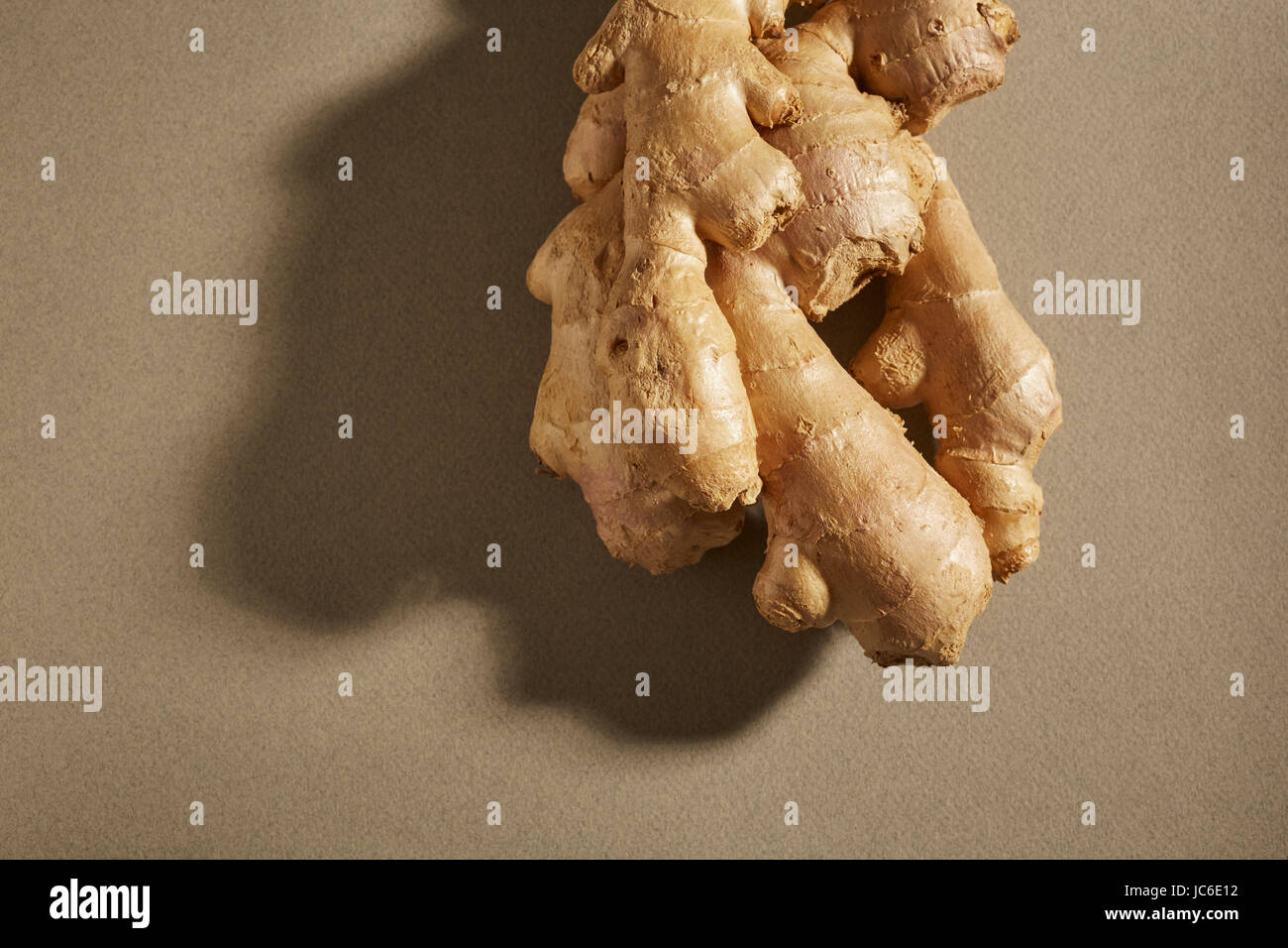 a whole fresh ginger root from China, an important ingredient in Asian ...