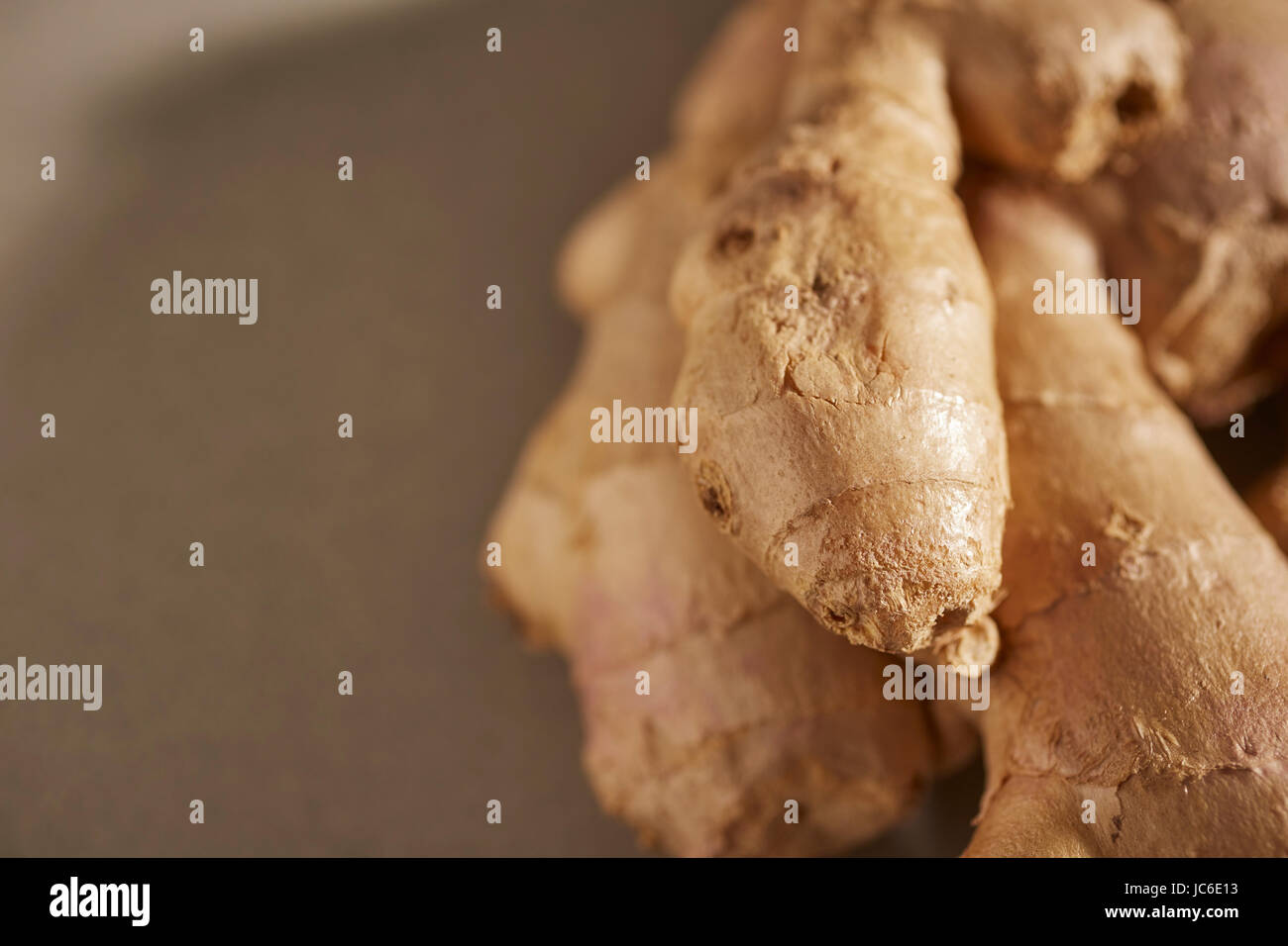 a whole fresh ginger root from China, an important ingredient in Asian ...