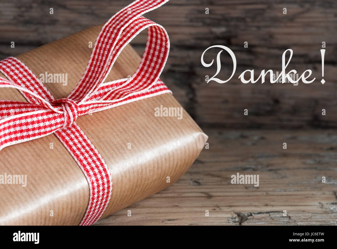 Rustic Gift on Wood with the German Word Danke which means Thanks Stock ...