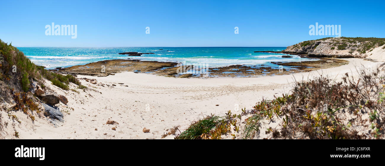 Wide panorama of a beautiful atlantic ocean bay, with white sand beach ...
