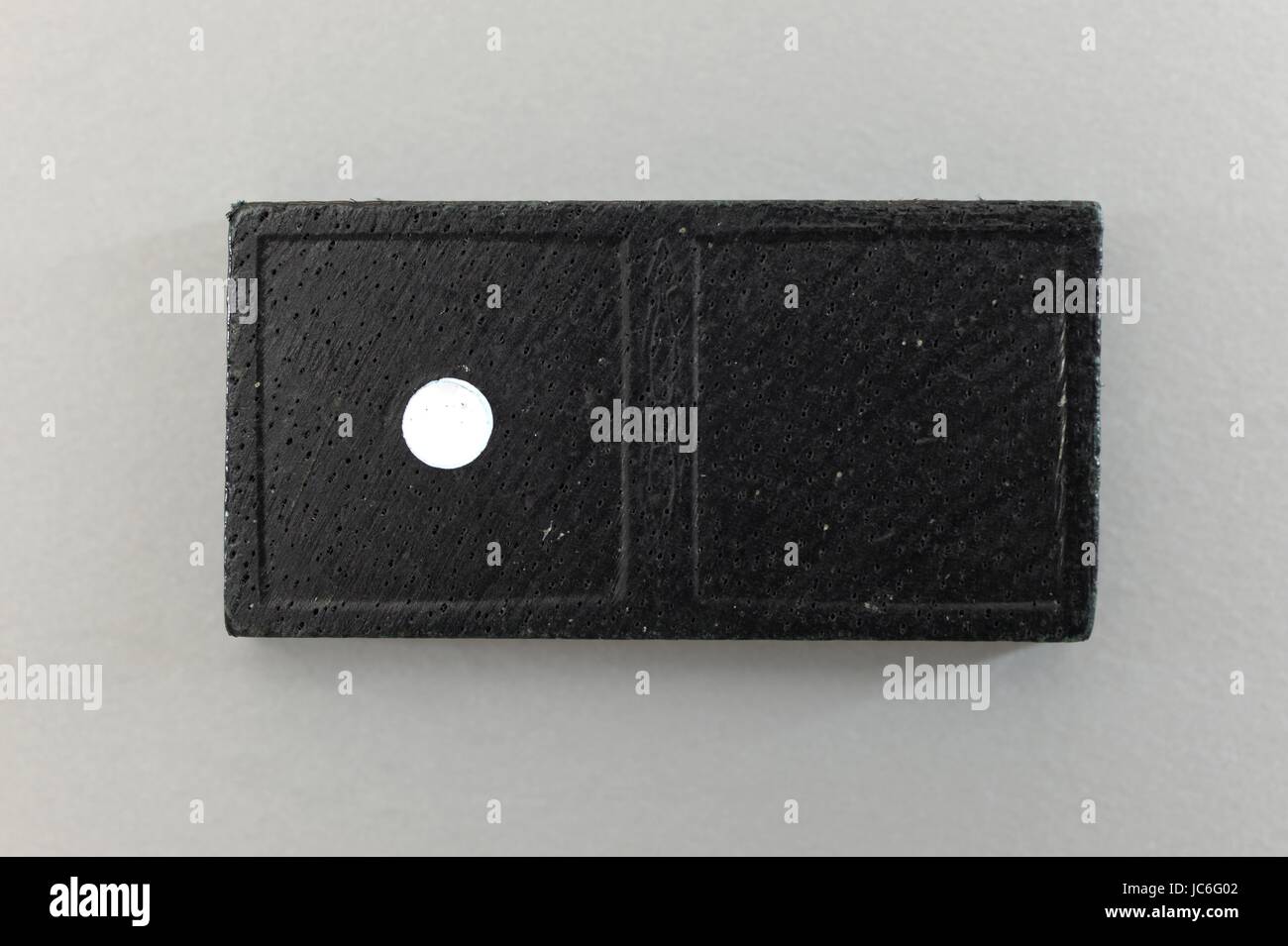 A close up shot of black and white dominos Stock Photo - Alamy