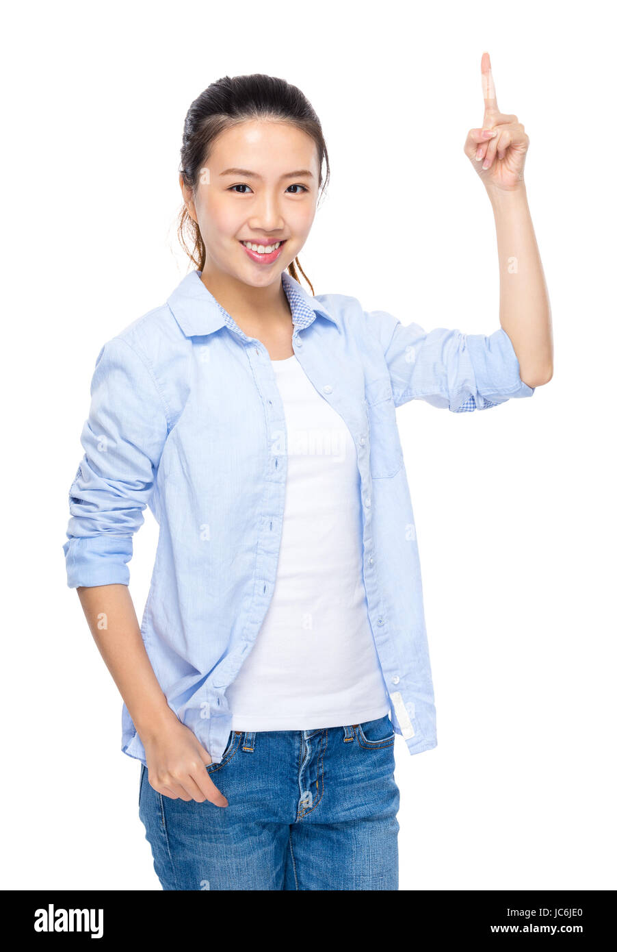 Young woman finger point up Stock Photo - Alamy