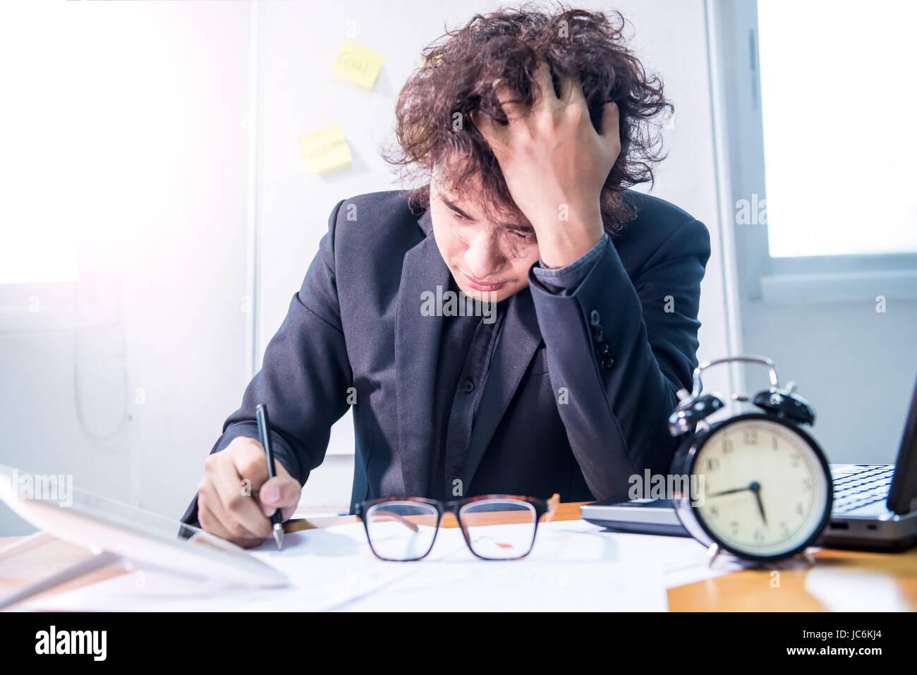 busy and headache person, unsuccessful businessman Stock Photo - Alamy