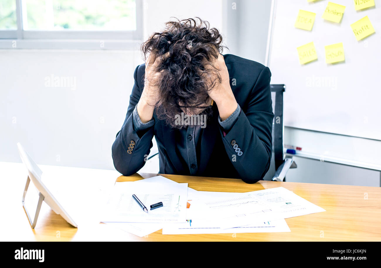 busy and headache person, unsuccessful businessman Stock Photo - Alamy