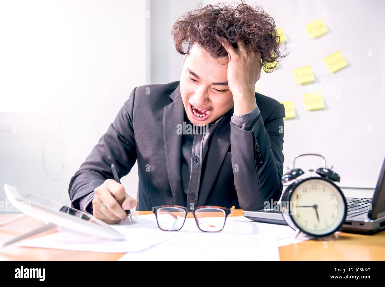 busy and headache person, unsuccessful businessman Stock Photo - Alamy