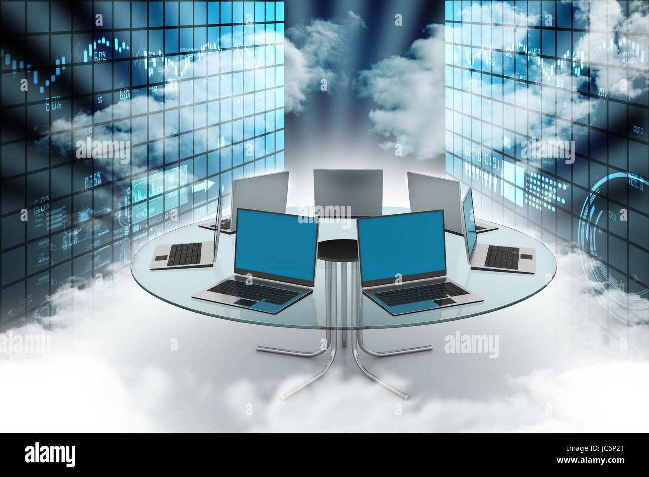 Laptop around the table Stock Photo - Alamy