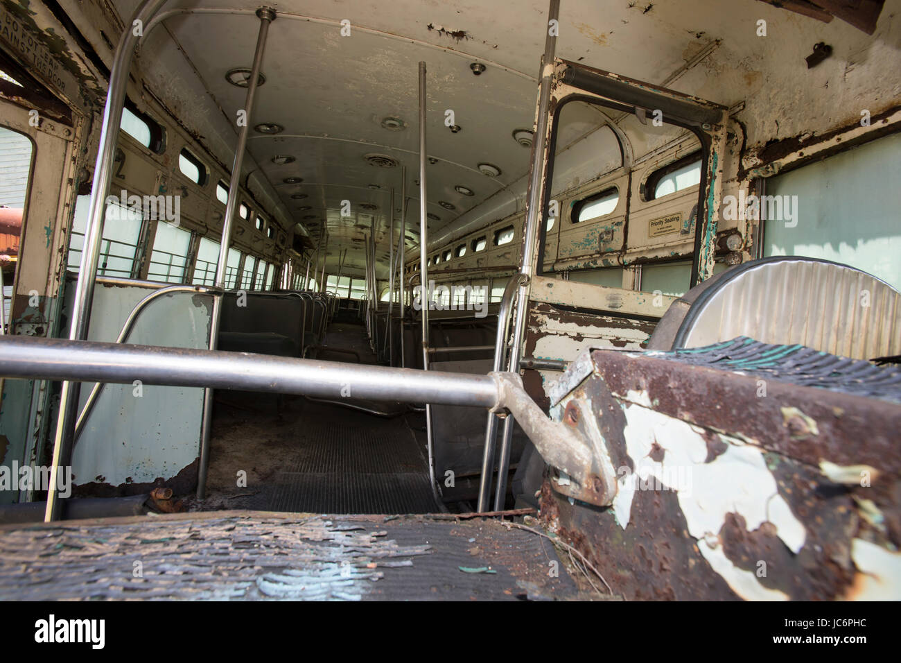 Rusting interior of abandoned trolley car Stock Photo - Alamy