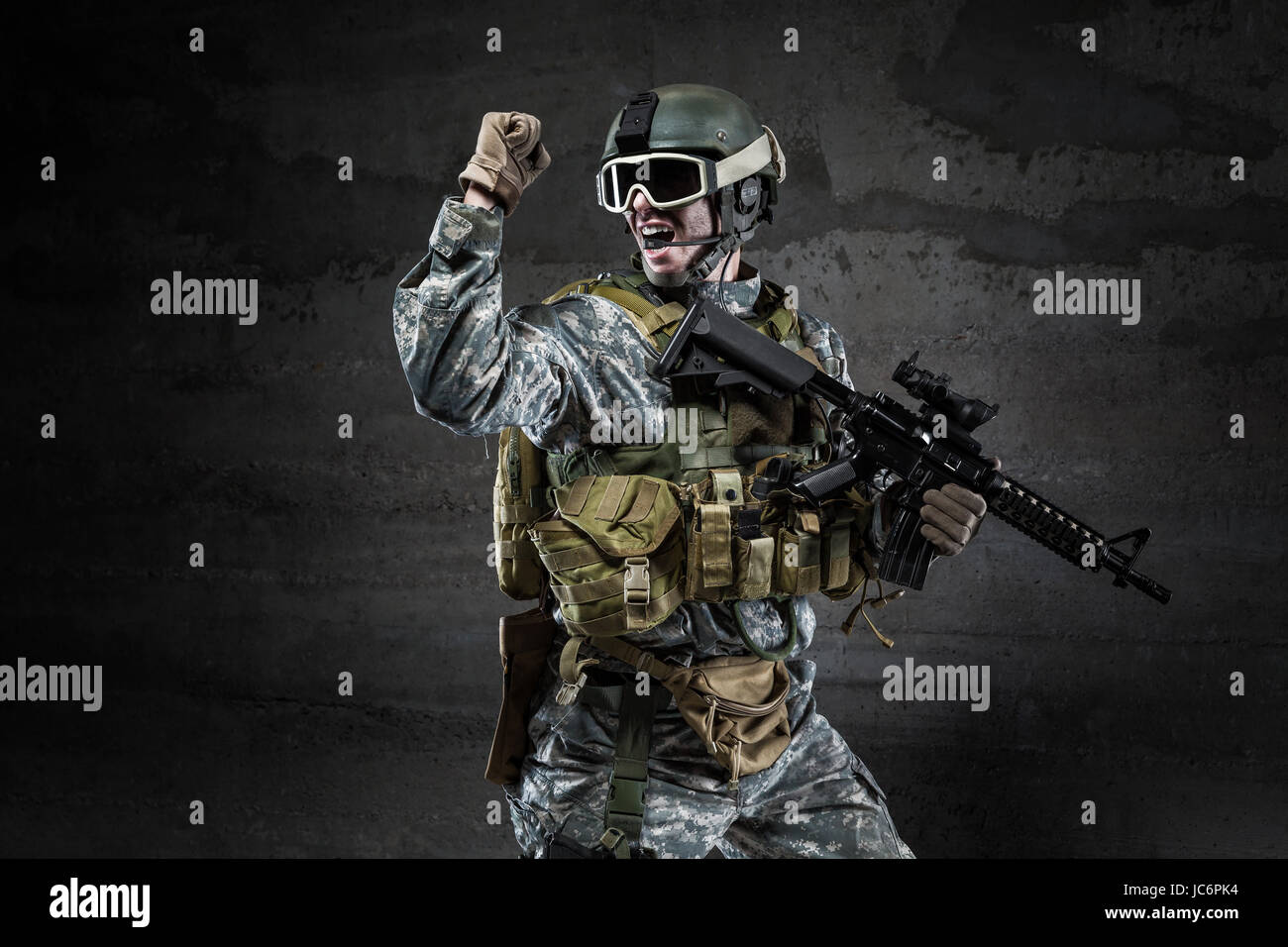 American Soldier shouting on dark background Stock Photo - Alamy