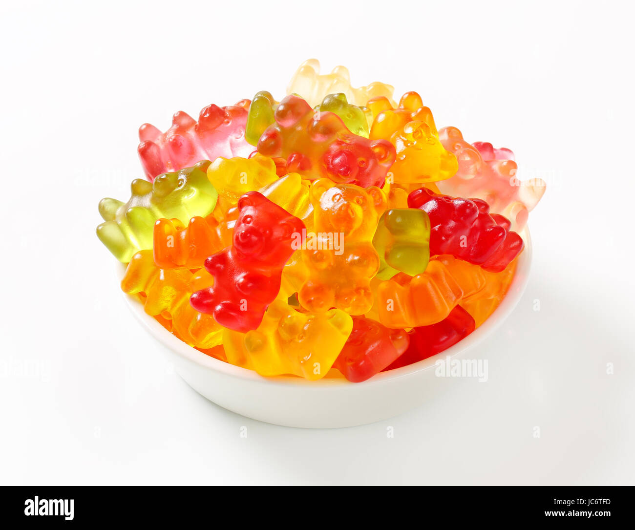 Fruit flavored gummy bears in assorted colors Stock Photo - Alamy