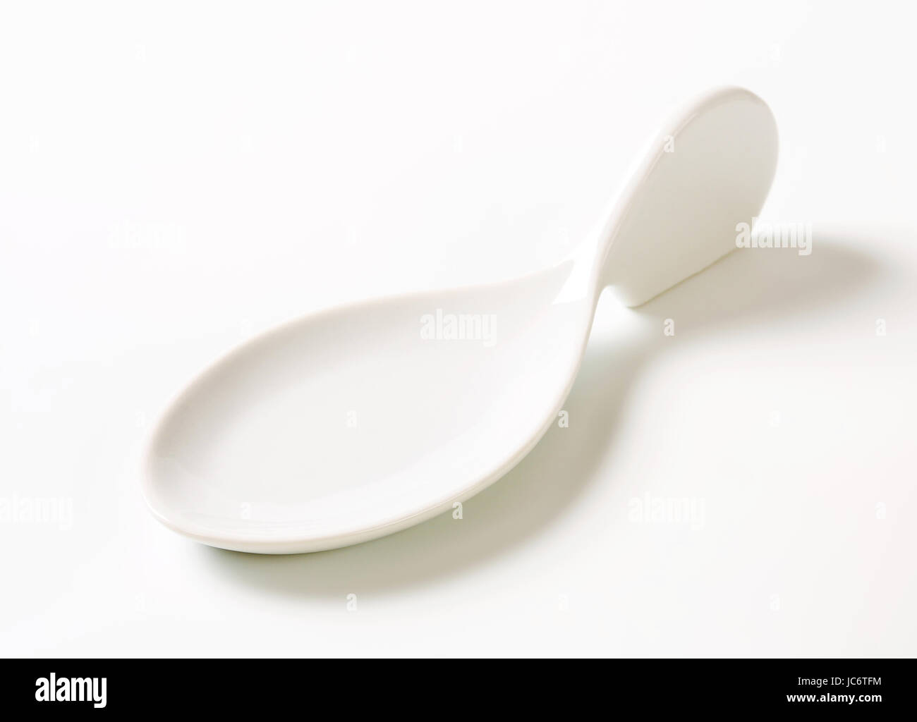 Modern porcelain spoon - studio shot Stock Photo - Alamy