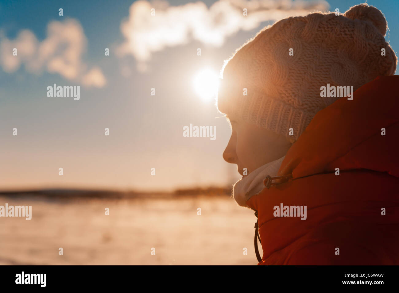 bright portrait of a girl in the bitter cold in the north backlit Stock ...