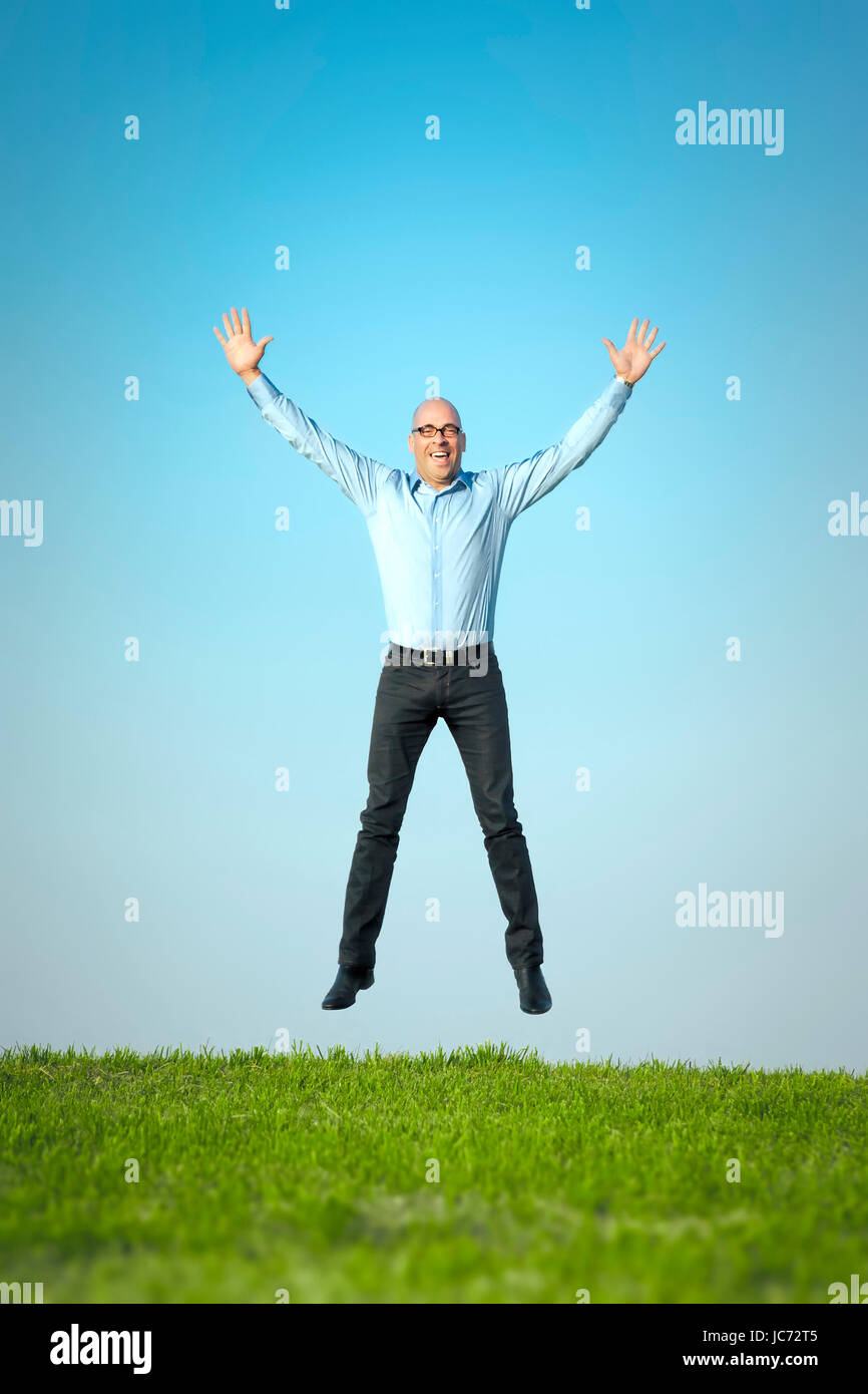 An image of a happy jumping man Stock Photo - Alamy