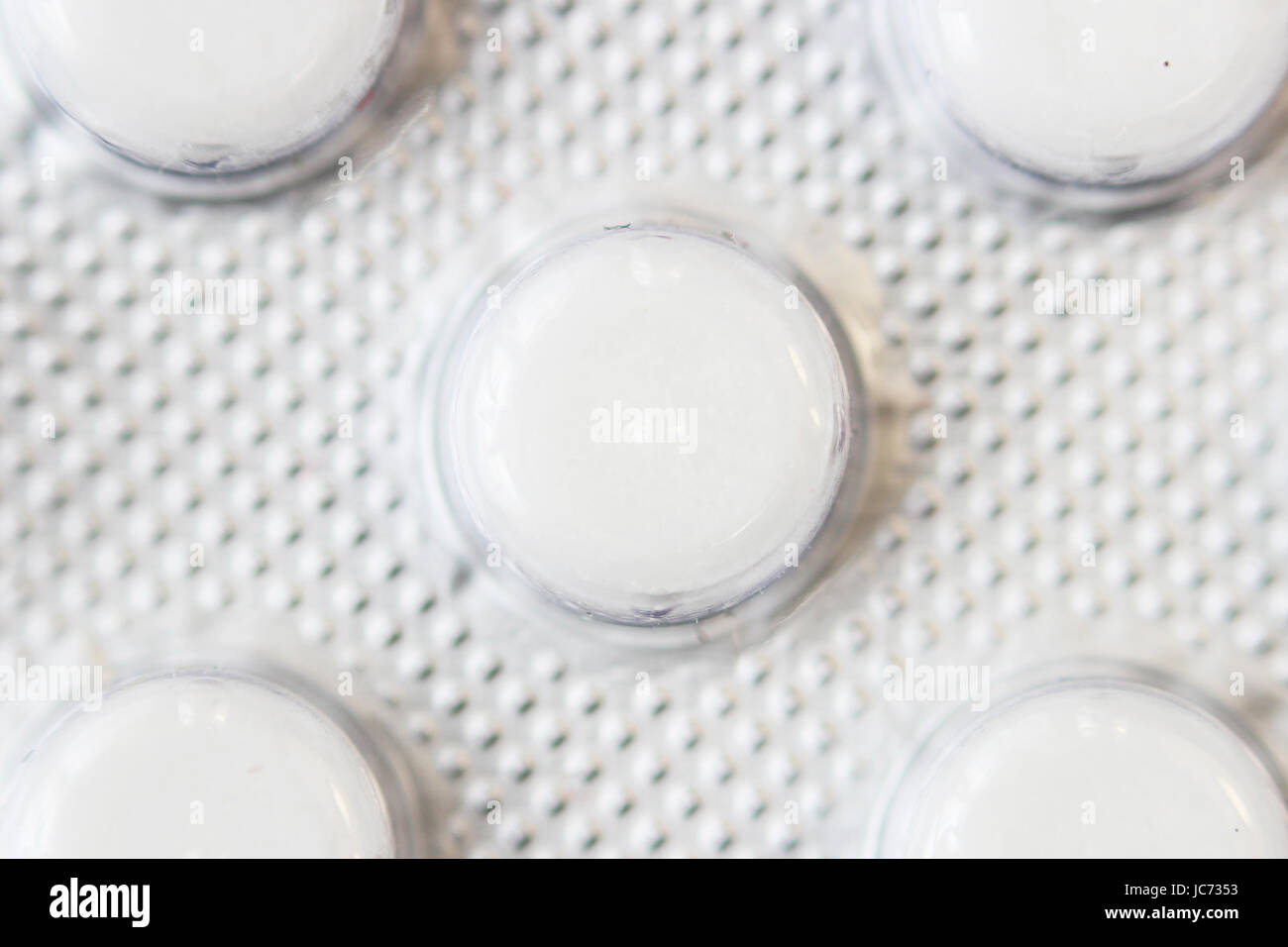Macro photo many white small tablets in blister push-trough pack Stock ...