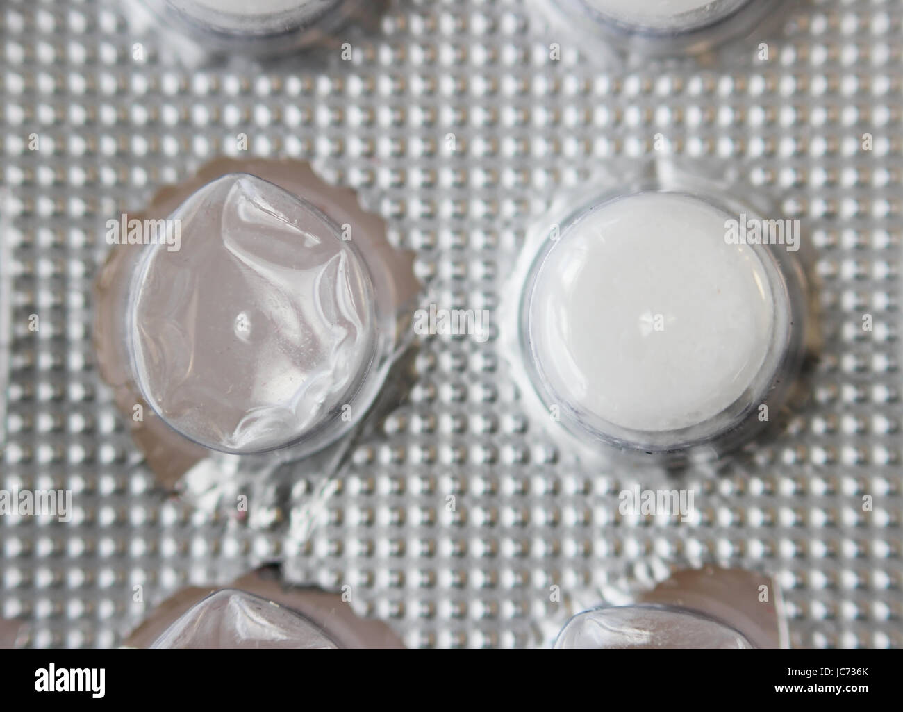 Macro photo many white small tablets in blister push-trough pack Stock ...