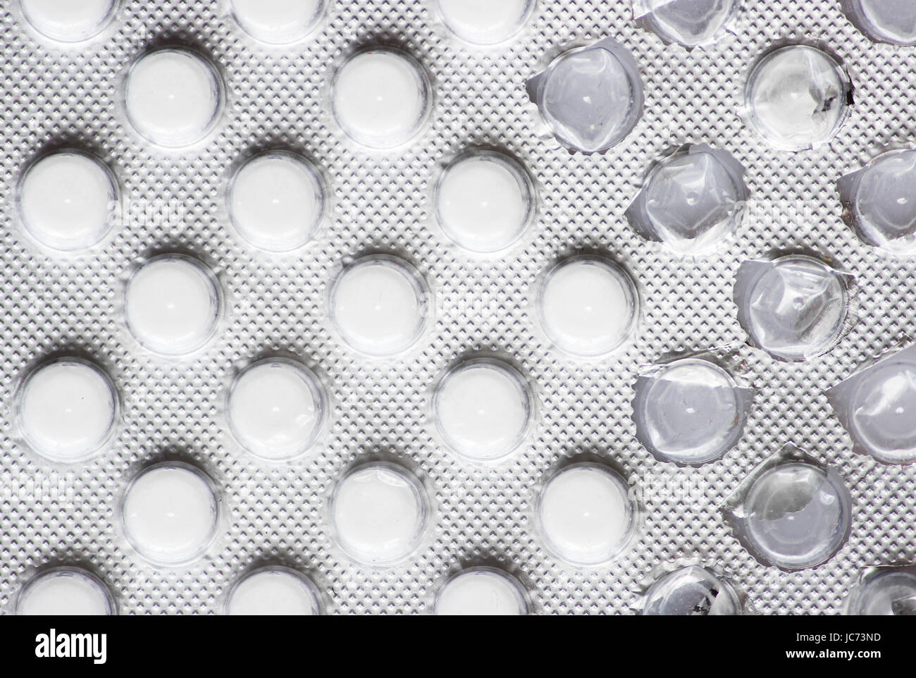 Macro photo many white small tablets in blister push-trough pack Stock ...