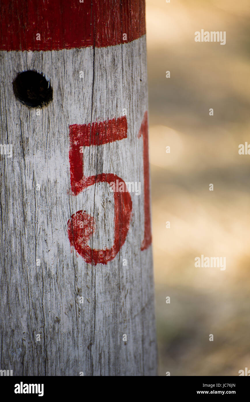 Wooden bollard with Number Stock Photo - Alamy