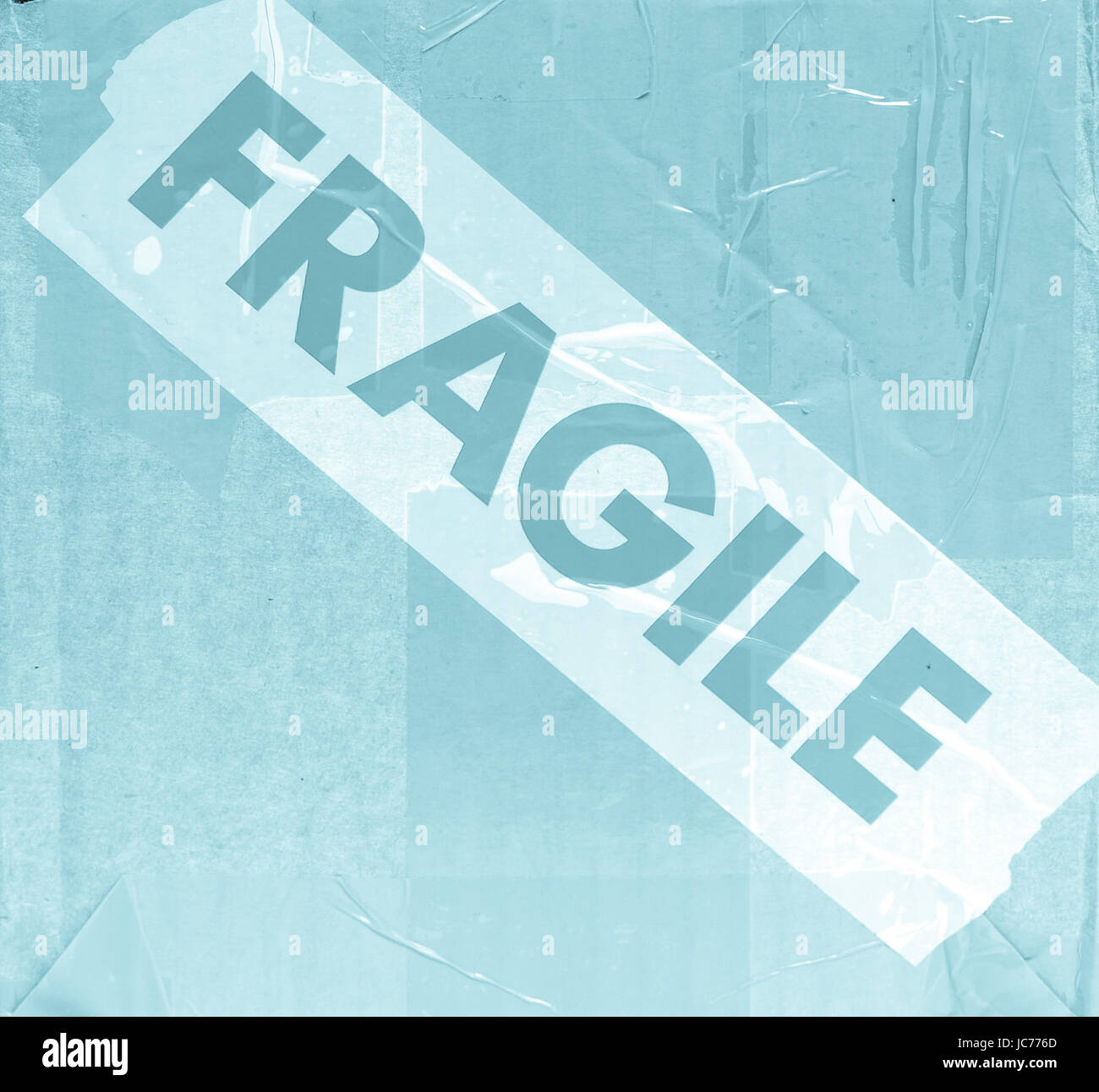 Detail of a fragile corrugated cardboard packet - cool cyanotype Stock Photo - Alamy