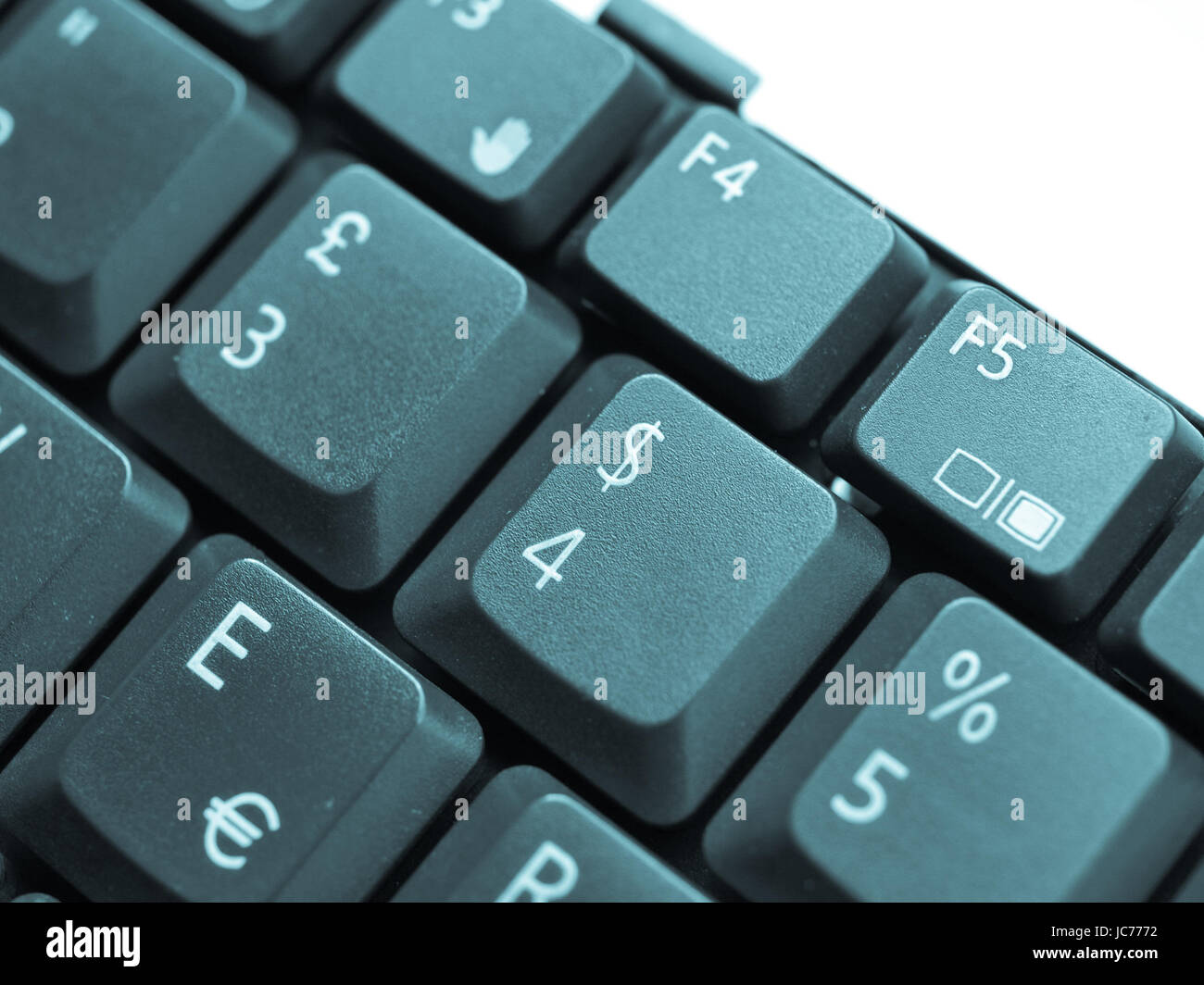 Detail of keys on a computer keyboard - cool cyanotype Stock Photo - Alamy