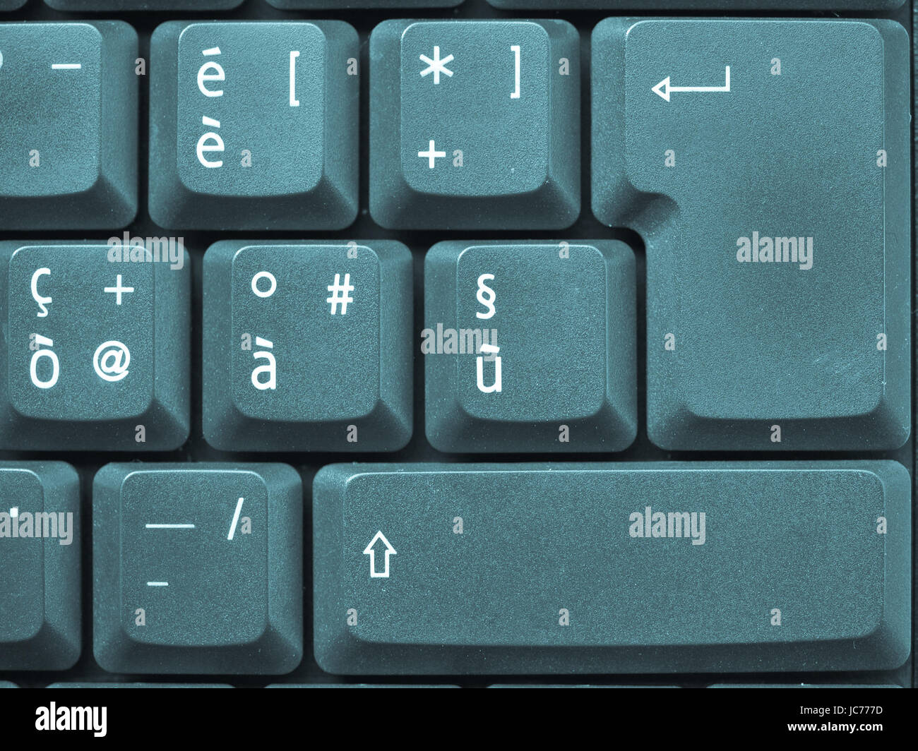 Detail of keys on a computer keyboard - cool cyanotype Stock Photo - Alamy