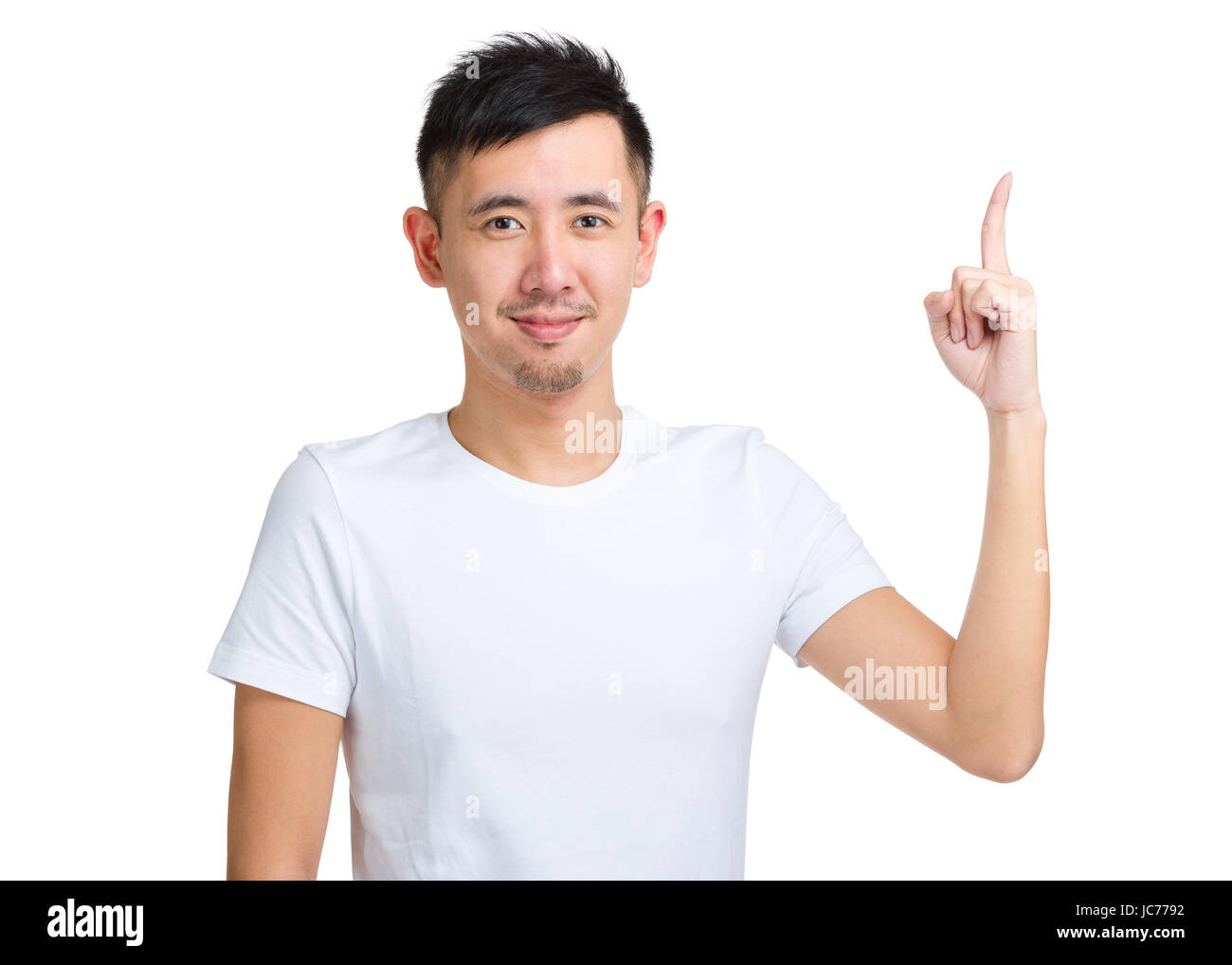 Young man with finger up Stock Photo - Alamy