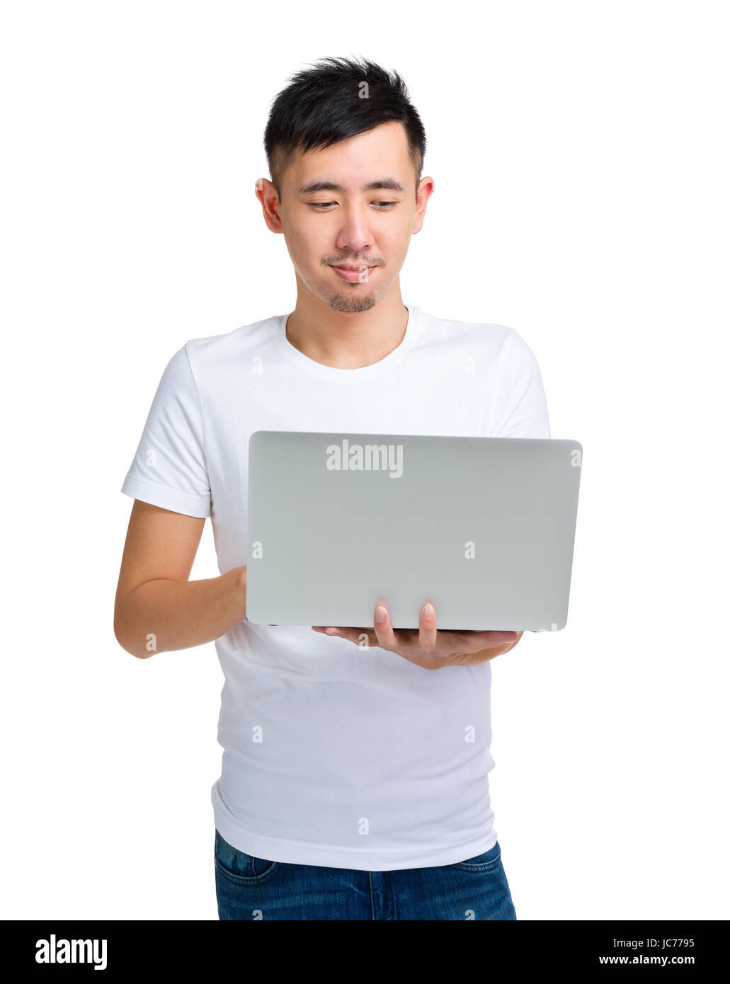 Young man use laptop computer Stock Photo - Alamy Young man use laptop computer Stock Photo - Alamy