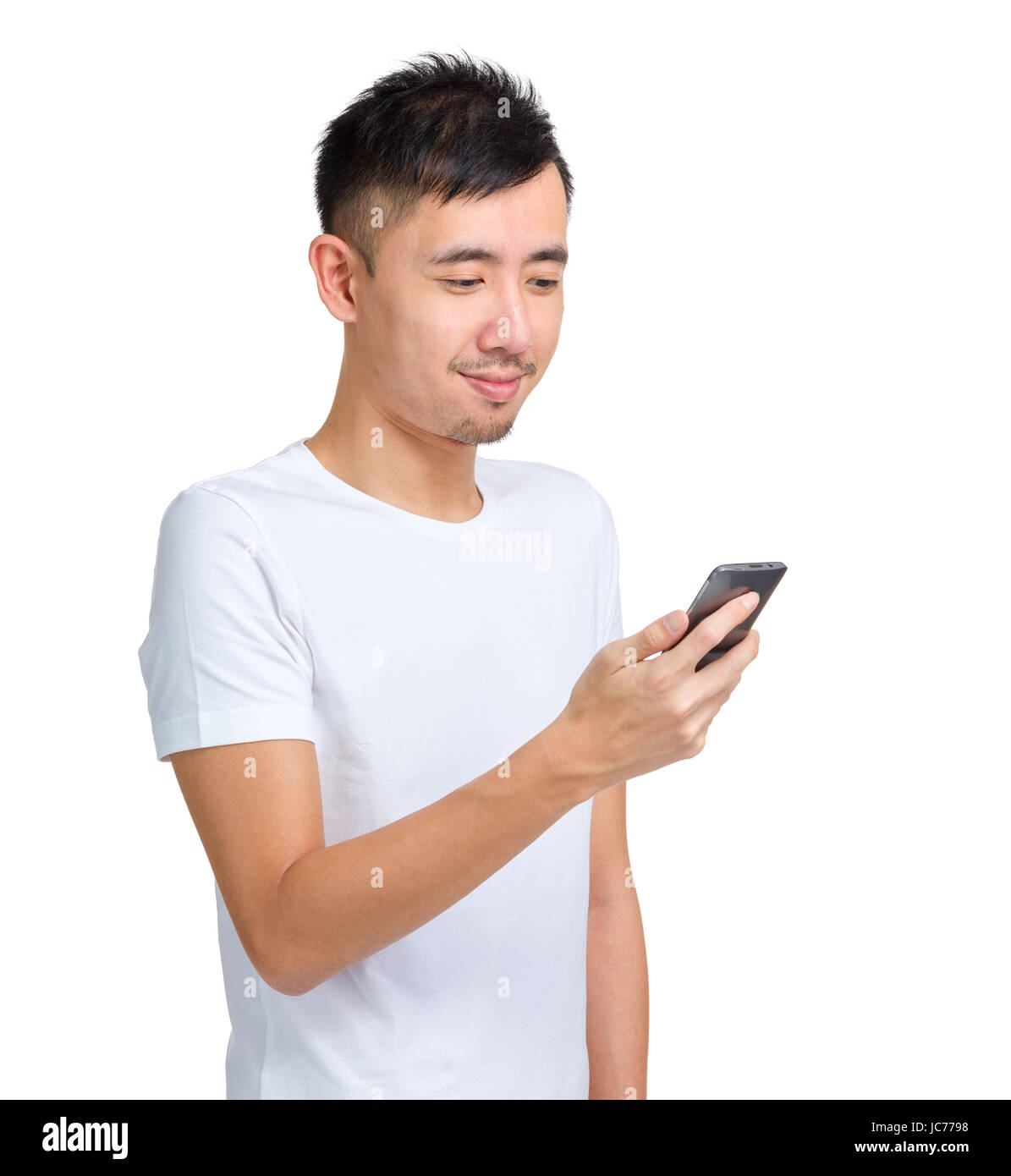 Asian man look at mobile phone Stock Photo - Alamy