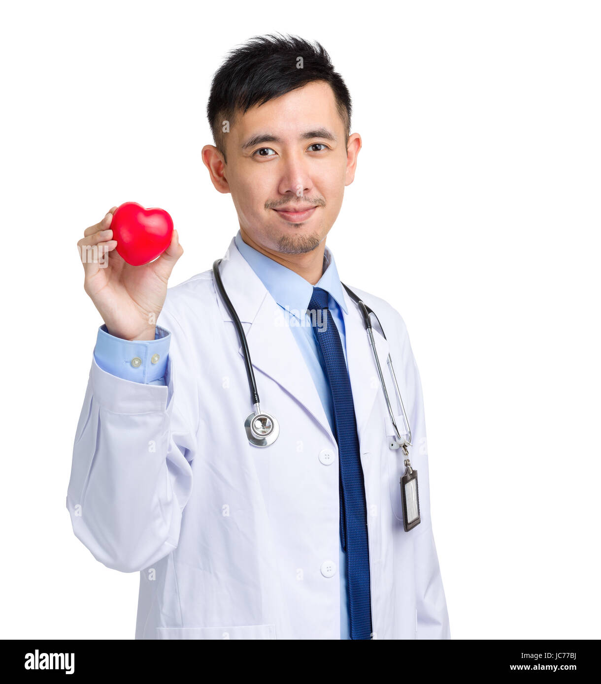 Male doctor with heart shape ball Stock Photo - Alamy