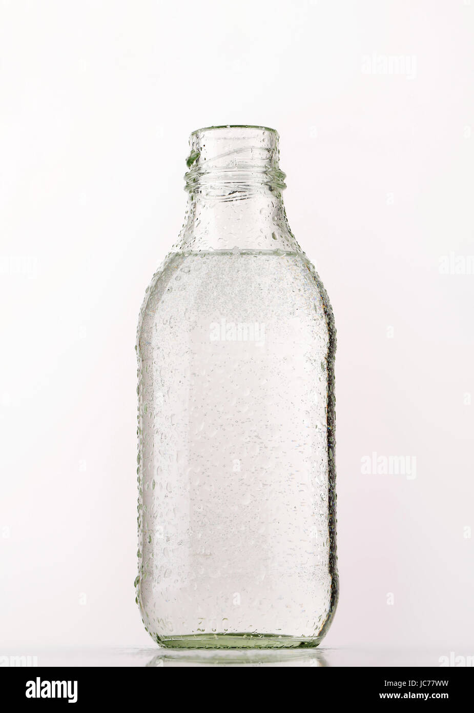 Purified water in a glass bottle Stock Photo - Alamy