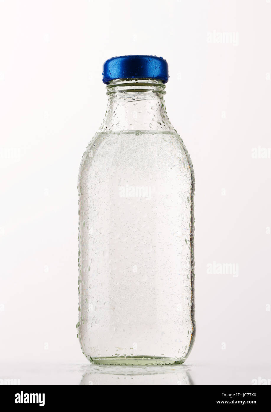 Purified water in a glass bottle Stock Photo - Alamy