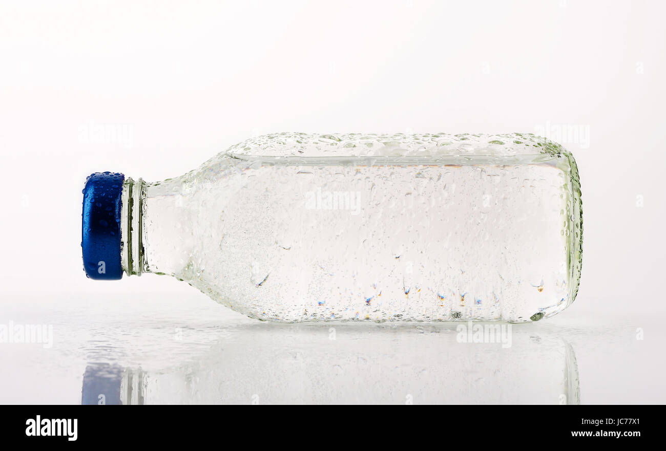 Purified water in a glass bottle Stock Photo - Alamy