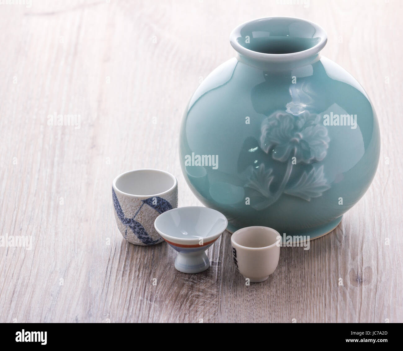 Japanese Sake drinking set on old wood texture background Stock Photo ...