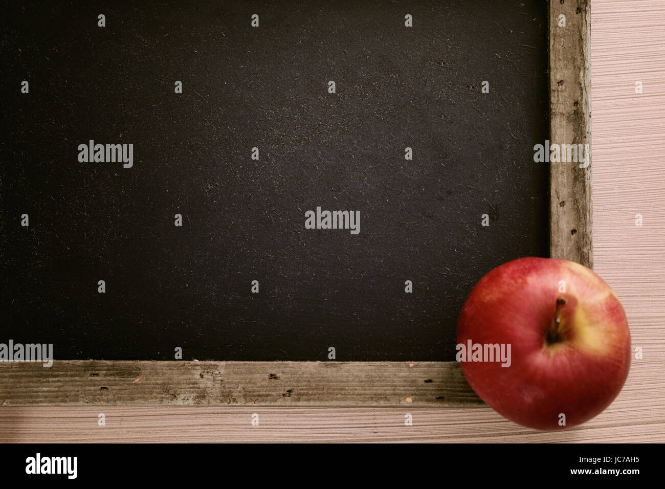 Back to school concept. Apple and chalkboard. Copy space Stock Photo ...