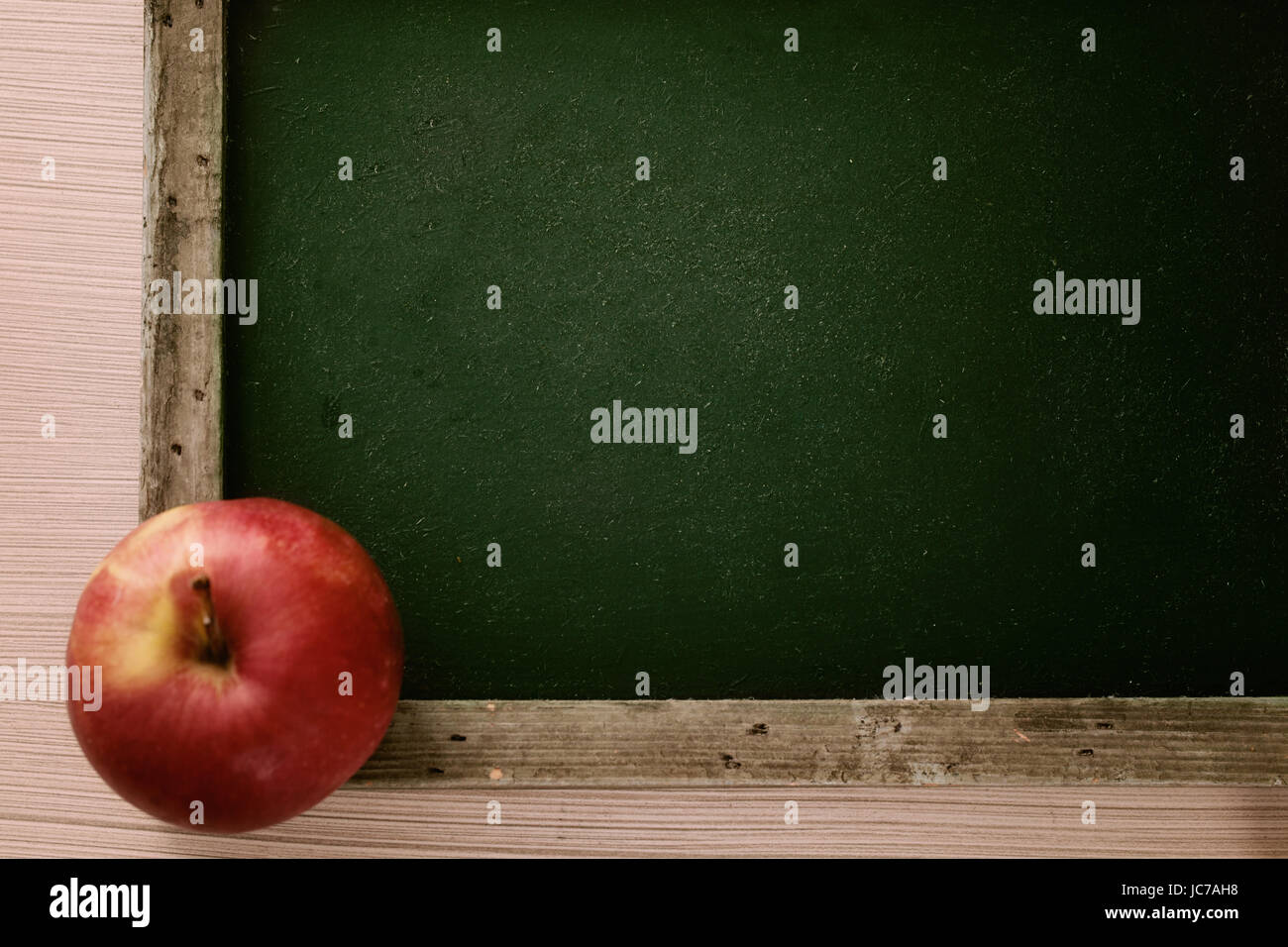 Back to school concept. Apple and chalkboard. Copy space Stock Photo ...