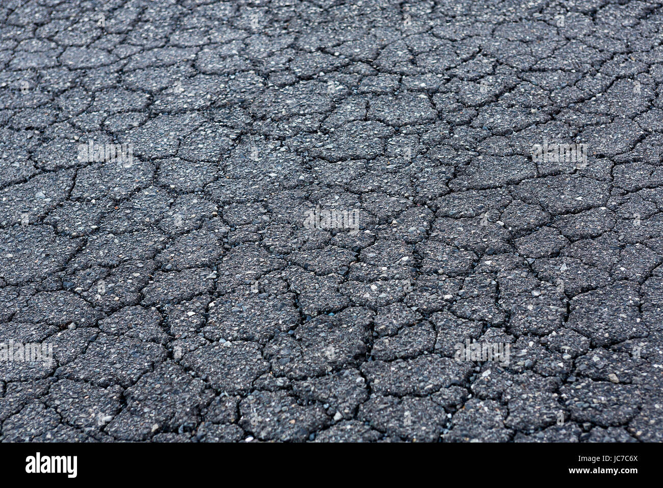 Cracked of road surface Stock Photo - Alamy
