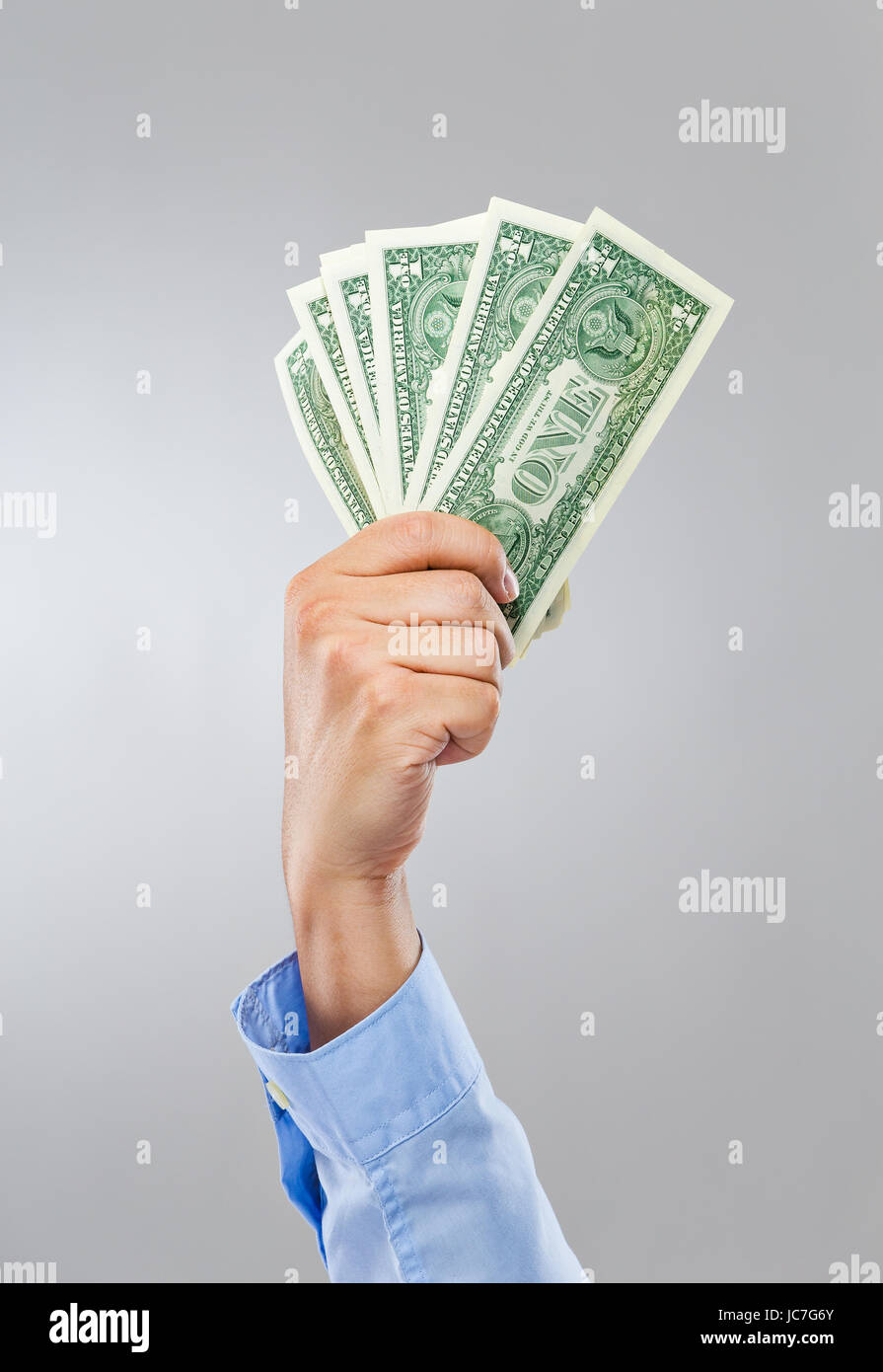 Businessman hand hold group of banknote Stock Photo - Alamy