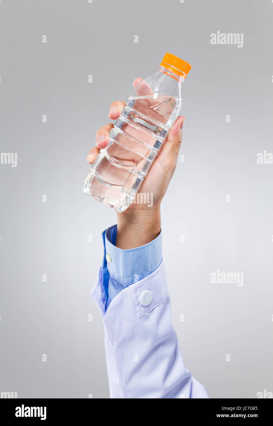 Doctor hold with water bottle Stock Photo - Alamy