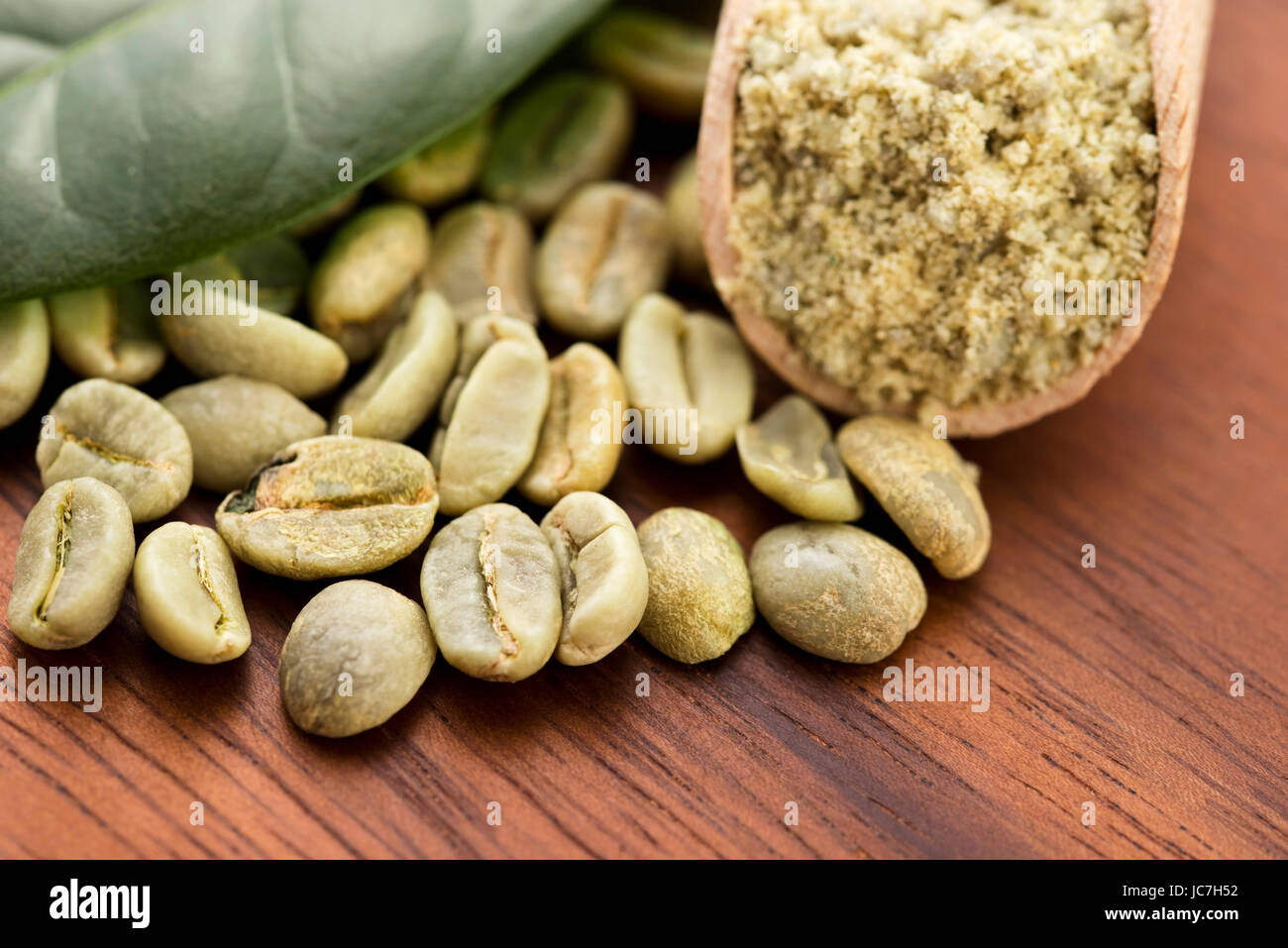 Green coffee beans with leaf Stock Photo - Alamy